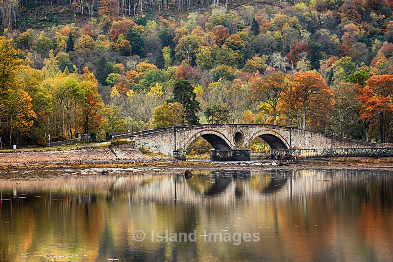 The Autumn colours over Inveraray Bridge